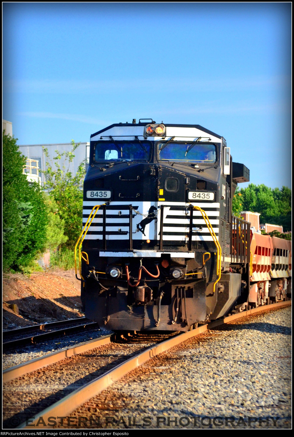 NS 8-40CW 8435 (ex CR 6257) leads an MOW train (945?) of ballast up the R Line. The train was ...